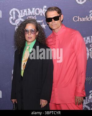 London, UK. Natalie Casey and John Partridge at the Diamonds and Dust ...