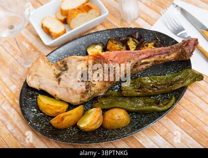 Lamb shoulder baked with new potatoes Stock Photo - Alamy