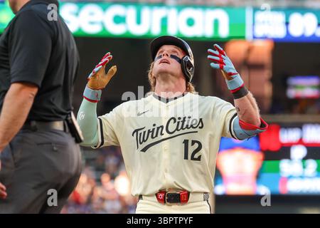 Minnesota Twins' Harrison Bader reacts after scoring on a RBI double ...