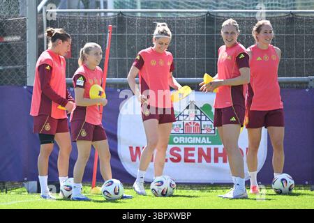 ZURICH, SWITZERLAND - JULY 12: Kathrin Hendrich of Germany L) battles ...
