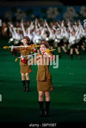 Women dressed as soldiers dancing with swords during Arirang, DGC ...