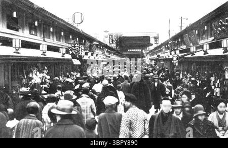 [ 1930s Japan - Japanese Shopping Street in Kobe ] — Shoppers walk in ...