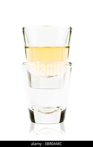 Shots of tequila on light background Stock Photo - Alamy