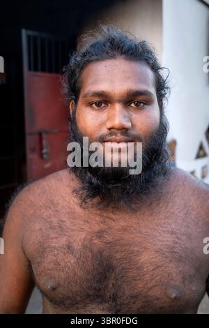 Monk of the Mahima Dharma Hindu sect says prayers and tends holy fire ...