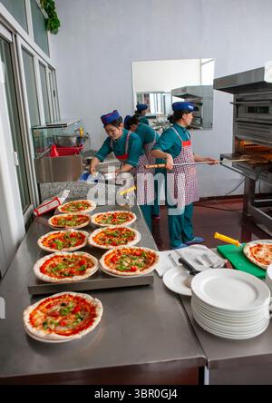 North Korean cooks in a pizzeria, Pyongan Province, Pyongyang, North ...