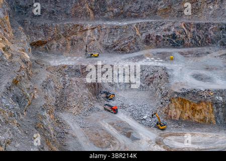 Active limestone quarry Kamieniołom Ostrówka. Visible heavy machinery ...