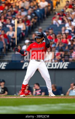 Cleveland Guardians catcher Bo Naylor, left, shakes hands with relief ...