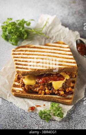 Close up view of tasty sloppy joe sandwich with ground meat, sauce and ...