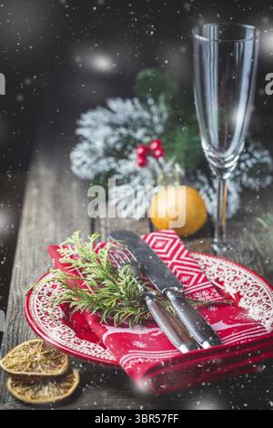Beautiful table setting with Christmas decorations on green background ...