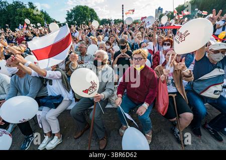 People attend a meeting in Minsk of Svetlana Tikhanovskaya ...