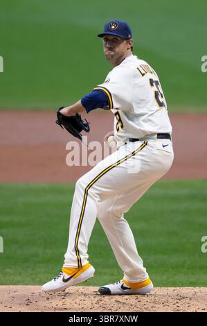 Milwaukee Brewers pitcher Josh Lindblom throws during spring training ...