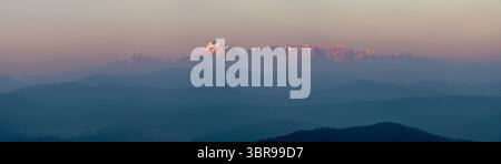 HIMALAYAN PEAKS glow at sunset in the Kullu Manali Valley Himachal ...