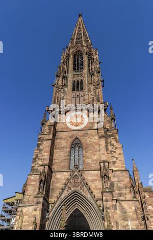 The Tower of the Freiburg Minster with clock in the city of Freiburg ...