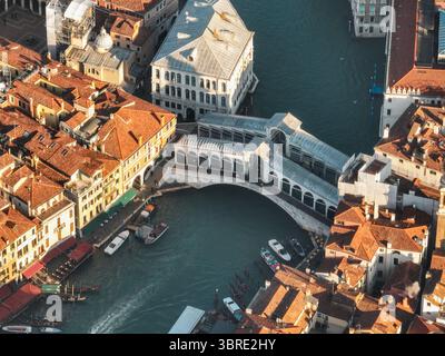 An aerial view of cityscape Venice surrounded by buildings Stock Photo ...