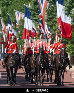 London, UK. 21 July 2025. A staff member with ‘Portrait of Iris ...