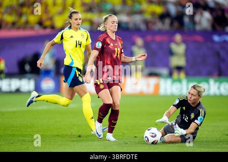 Sweden goalkeeper Jennifer Falk, right, makes a save against England's ...