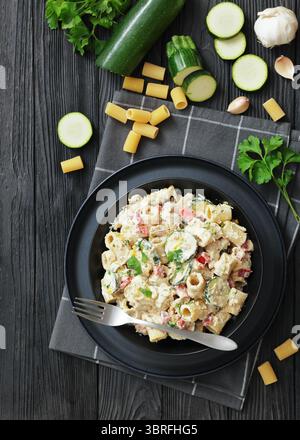 Italian rigatoni chicken alfredo pasta dish with broccoli Stock Photo ...