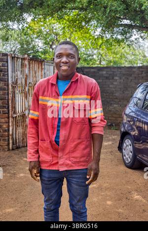 portrait of african man worker with a rugged manly look, big toothy ...