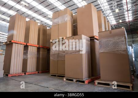 Cardboard box arranged in warehouse Stock Photo - Alamy