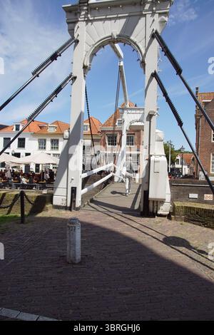 White drawbridge (national monument) of the Dutch city Enkhuizen. The ...
