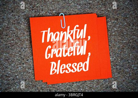 Thankful, grateful, blessed text message with autumn maple leaves and ...