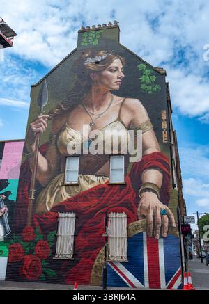 Street Art in Southend Graffiti Artist painting Purple Girl with Pink ...