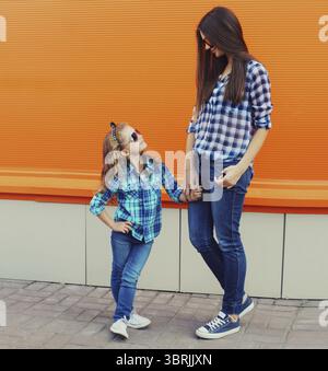 Beautiful teenager child girl look finger specs okey symbol silly ...