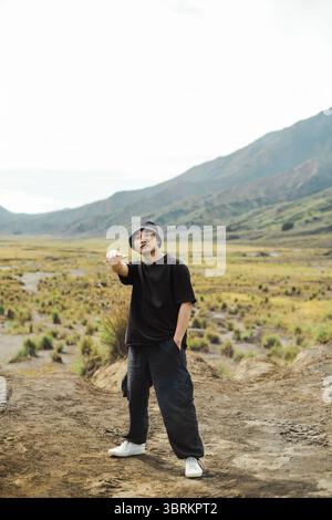 The Asian man was pointing forward Stock Photo - Alamy