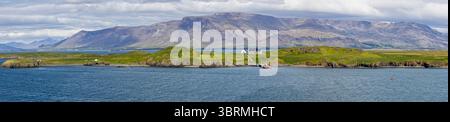 A scenic view of Videy Island on a lake near Reykjavik, Iceland on a ...