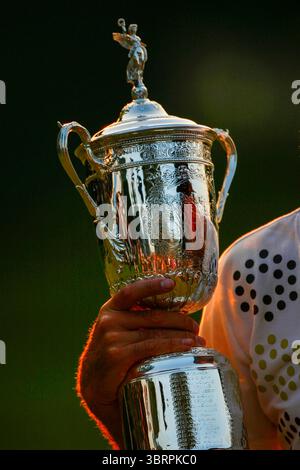 Geoff Ogilvy with the trophy after winning the tournament on the final ...