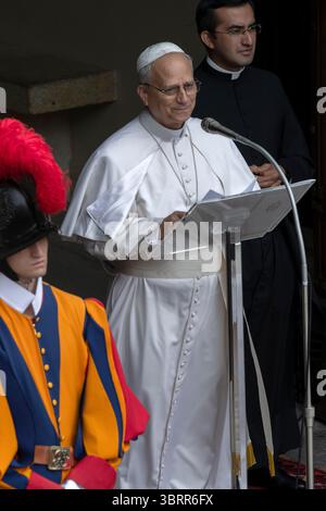 Pope Leo XIV delivers the Angelus prayer from the window of his studio ...