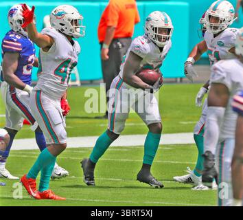 Miami Dolphins cornerback Noah Igbinoghene (23) defends New England ...