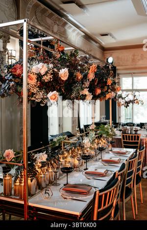 Chic dining setup. Luxurious table setting featuring delicate lights ...