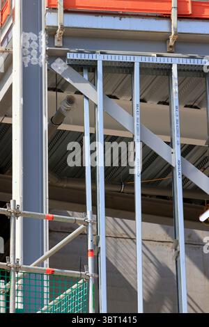 Steel skeleton frame with secondary steelwork, cross brace and weather ...