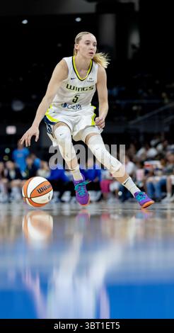 Dallas Wings guard Paige Bueckers (5) stops to take a selfie with a fan ...