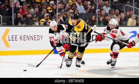 Boston Bruins' Jeremy Lauzon plays against the New Jersey Devils during ...