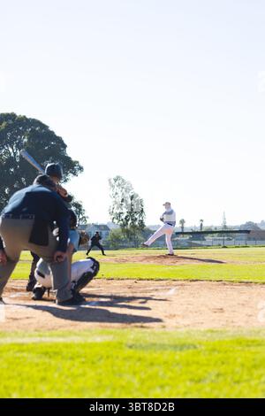 Baseball bat, ball, glove and mask isolated on a field of grass ...