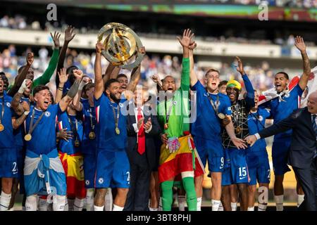 Chelsea players celebrate with the trophy after the final whistle the ...