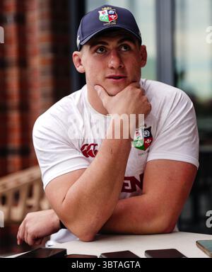 Dan Sheehan of the British & Irish Lions, center, goes on the charge ...