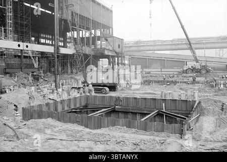 This image shows the construction of a blast furnace with a BHP ship in ...