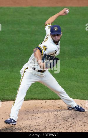 Milwaukee Brewers' pitcher Alex Claudio throws against the Minnesota ...