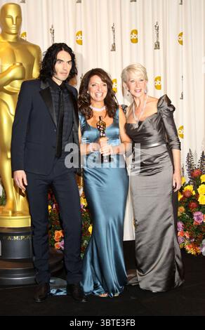 Russell Brand, Susanne Bier and Helen Mirren at the 83rd Academy Awards ...