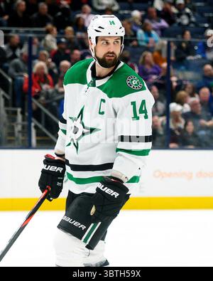 Dallas Stars left wing Jamie Benn looks at a puck drop during the first ...