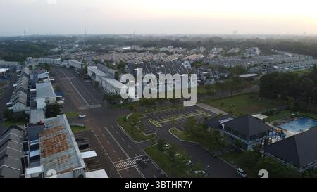 Aerial view reveals rows of modern residential houses nestled in a ...