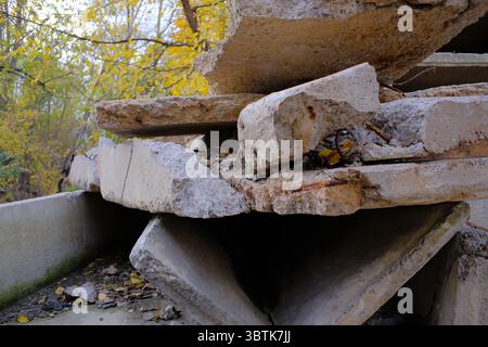 Large construction debris, concrete slabs and blocks lie in the city ...