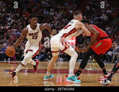 Atlanta Hawks' De'Andre Hunter drives past Milwaukee Bucks' Jevon ...