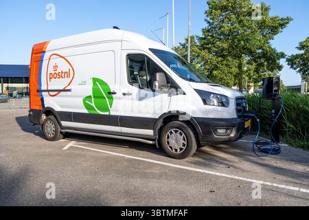 PostNL Ford Transit electric delivery van Stock Photo - Alamy