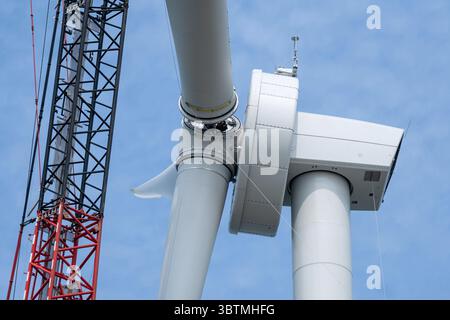 assembly of a rotor blade on a newly installed wind turbine Stock Photo ...