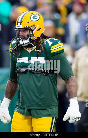Green Bay Packers' Billy Turner wear a Crucial Catch headband as he ...