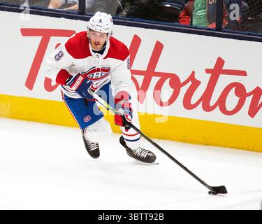 Montreal Canadiens defenseman Ben Chiarot (8) shoots the puck as Nashville Predators center Ryan ...